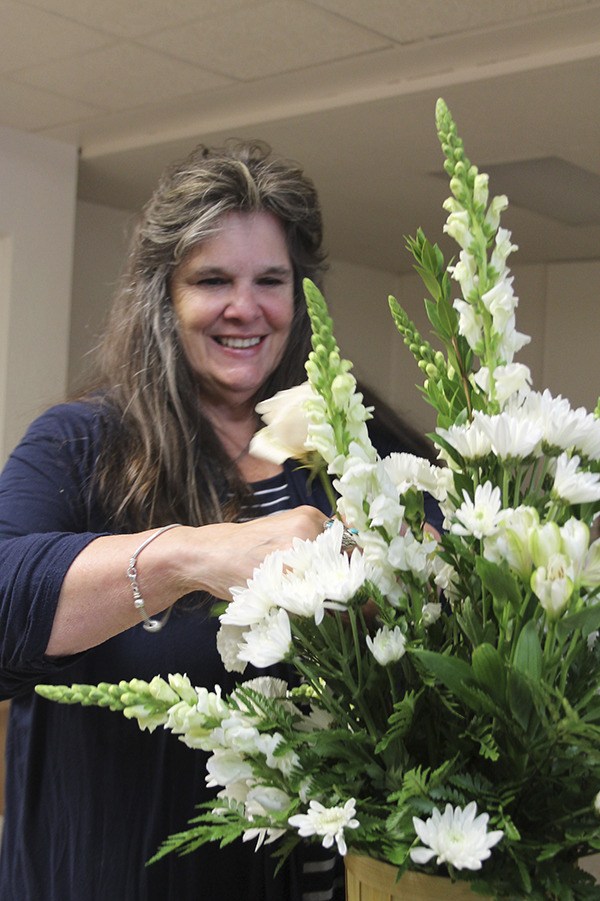 In her shop or on the street, flowers are her biz | Kitsap Daily News